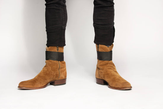 The Boot Girdle is a compression strap for the shaft of cowboy boots